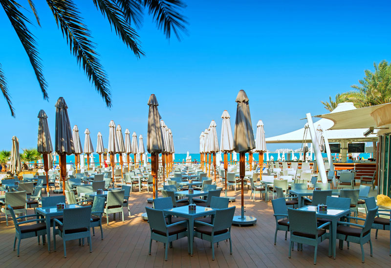 Hilton JBR’s beachside eatery offers aged-based discount - Hotelier ...