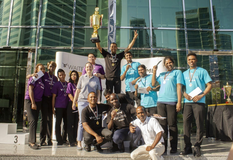 Waiters race through Dubai streets for fastest waiter title - Hotelier ...