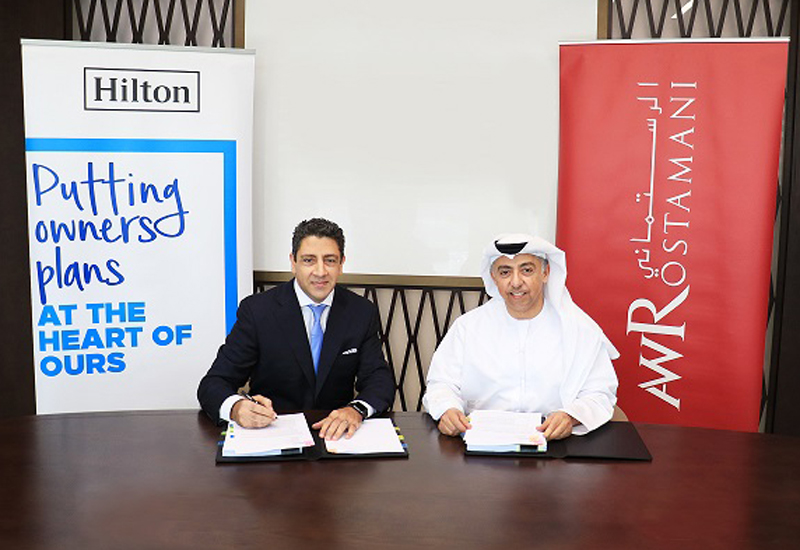 Hilton and AW Rostamani Group sign management agreement - Hotelier ...